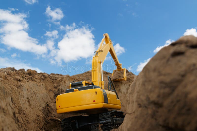 Selective Focus ,Back View of Excavator are Digging the Soil. Stock ...