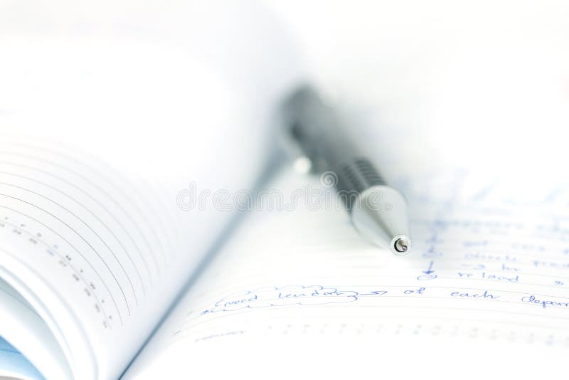 Selective Focus of Ball Pen on Opened Lined Diary Book Stock Photo ...