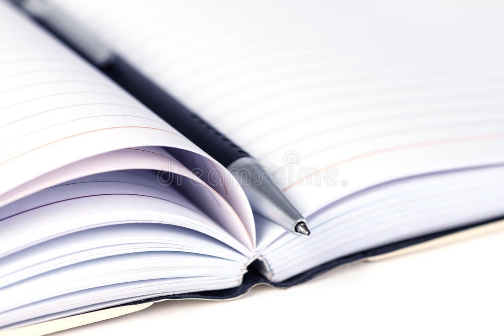 Selective Focus of Ball Pen on Opened Lined Diary Book Stock Photo ...