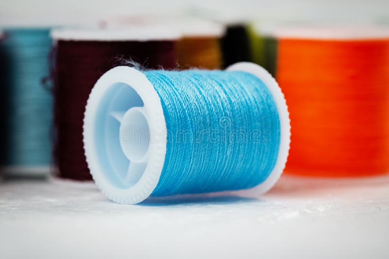 In Selective Focus of Blue Thread on Background Stock Photo - Image of ...