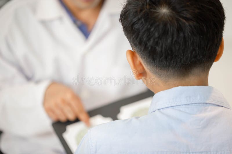 Selective Focus of Boy Doing Eye Test Checking Examination with ...