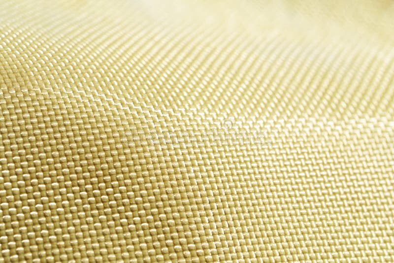 Bulletproof Material Aramid. Shining Aramid Kevlar Background. Golden ...