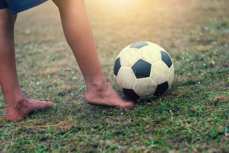 Selective Focus Children Feet Play and Soccer Ball Stock Photo - Image ...