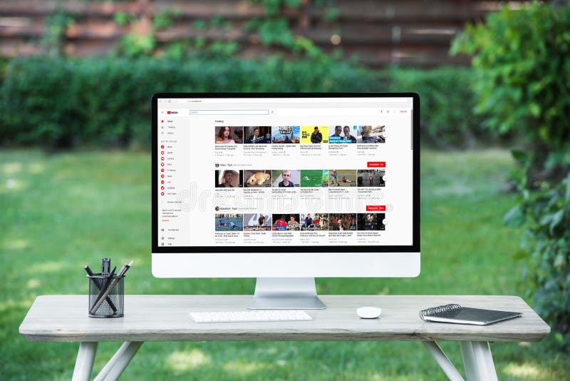 Selective Focus of Computer with Youtube Website at Table Editorial ...