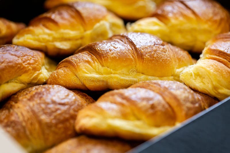 Selective Focus on a Croissant in a Box Full of Pastries Stock Image ...