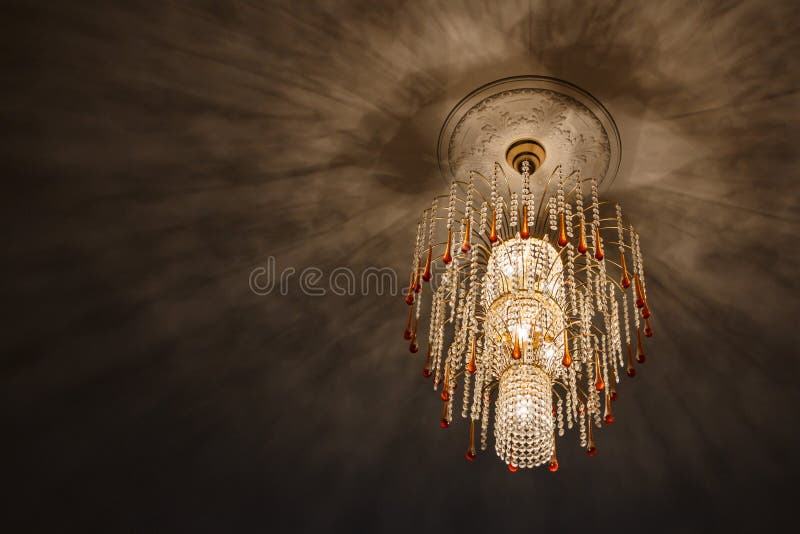 Selective Focus of Crystal Chandelier , Ceiling Lights, Black Shadows ...