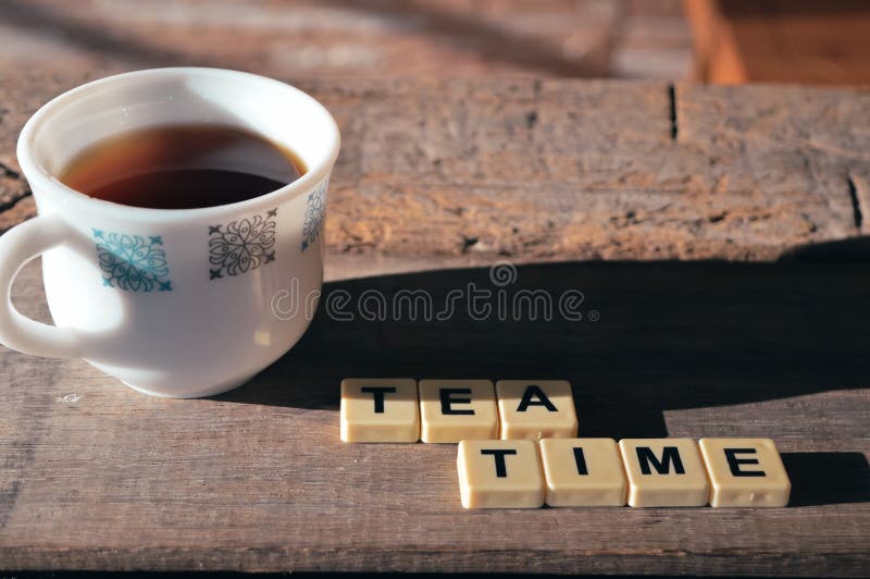 A Cup of Nescafe and Square Letters with Text TEA TIM Stock Photo ...