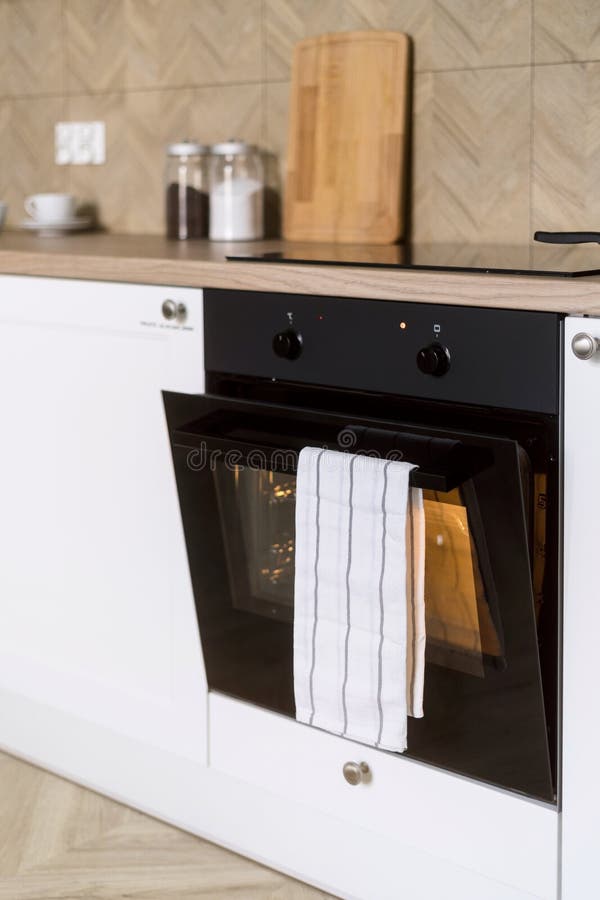 Selective Focus on Electric Oven with Opened Door and Turning on Light ...