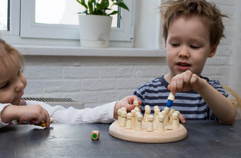 Selective Focus, Face is Blurred. Wooden Board Game for Children Memory ...