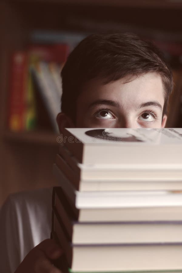 Selective Focus on Face of Child with Books. Stock Photo - Image of ...