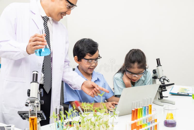 Selective Focus at Face. Young Asian Boy and Girl Smile and Having Fun ...