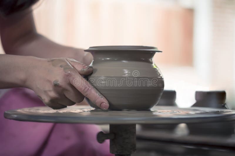 Female Hand Making Clay Pot on Pottery Spinning Wheel Stock Image ...