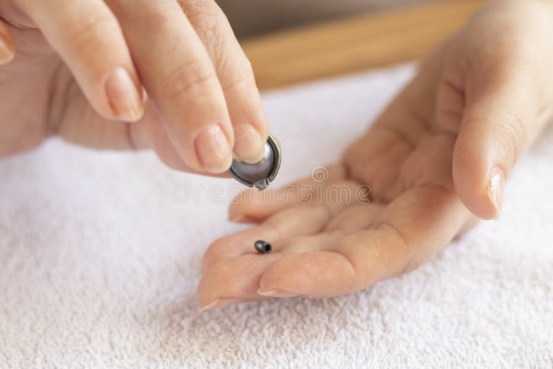 Selective Focus. Female Hands Hold a Open Capsule for the Face Stock ...