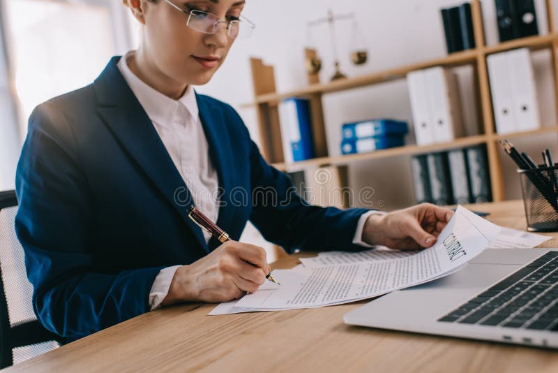 Selective Focus of Female Lawyer Doing Paperwork at Workplace Stock ...
