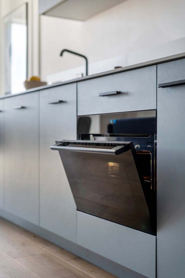 Selective Focus on Glass Opened Door with Handle on Integrated ...