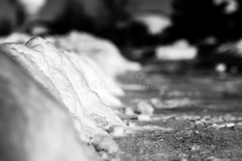 Selective Focus Ground Level View of Snow Blown Sidewalk Section with ...
