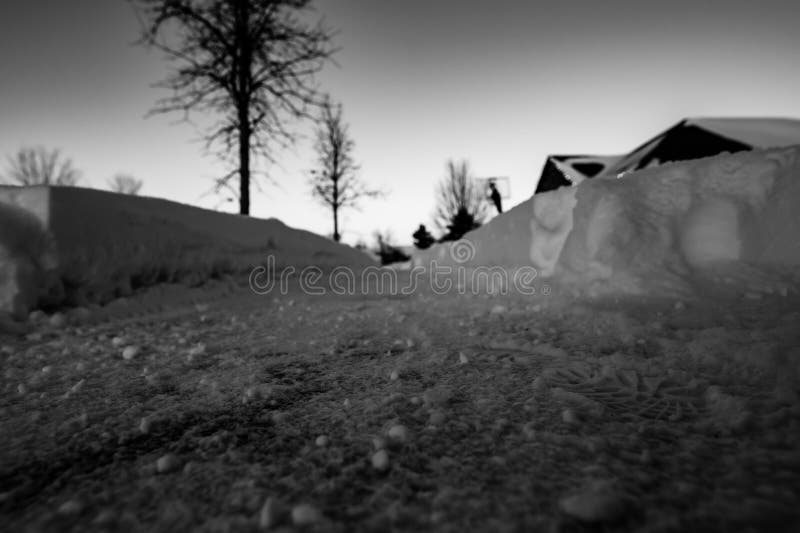 Selective Focus Ground Level View of Snow Blown Sidewalk Section with ...