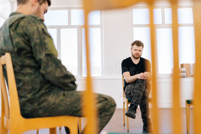 Selective Focus of Group Male Soldiers in Camouflage Uniform Talking ...