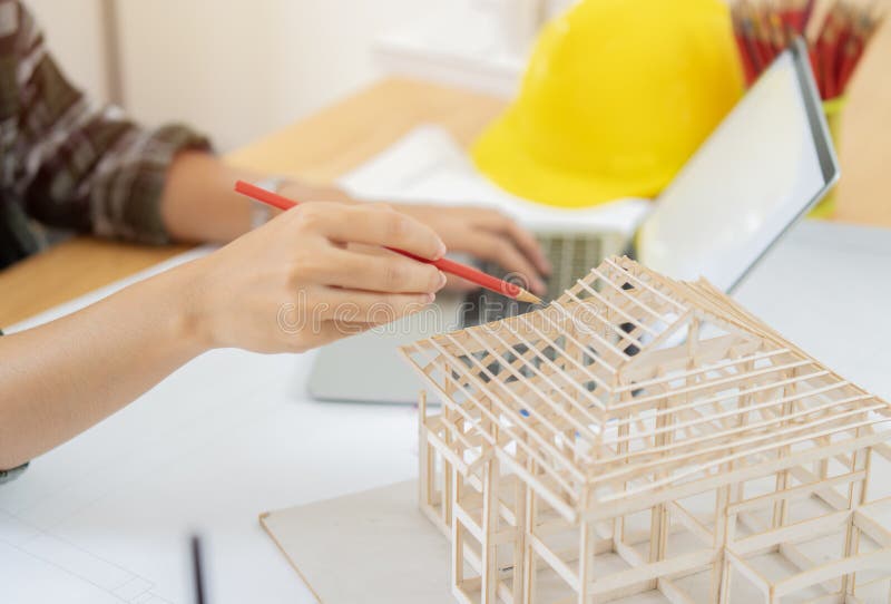 Selective Focus Hand of Engineer Working in Office with Blueprints, Inspection in Workplace for ...
