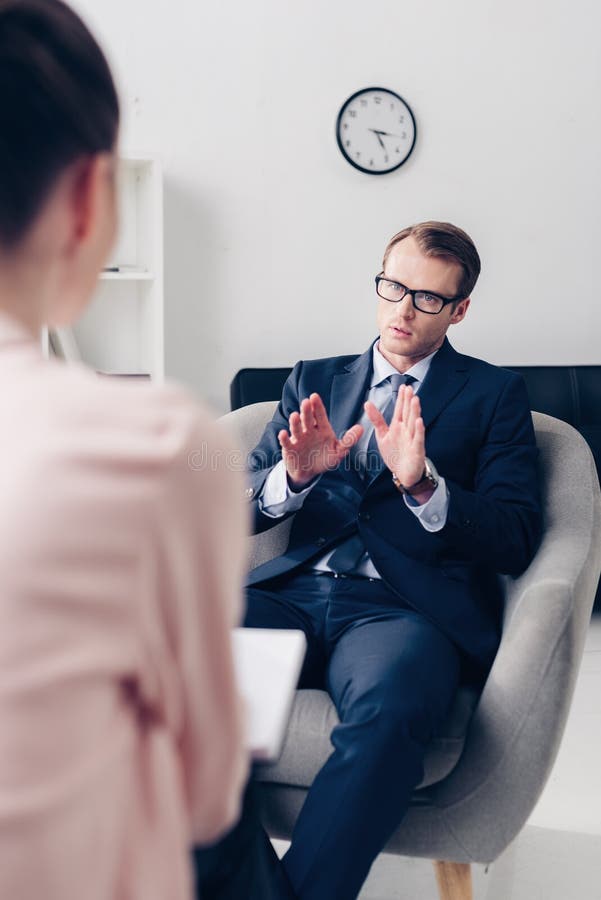 Selective Focus of Handsome Businessman Gesturing while Giving ...