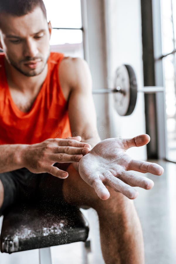 Focus of Handsome Sportsman Looking at White Powder on Hand Stock Photo ...
