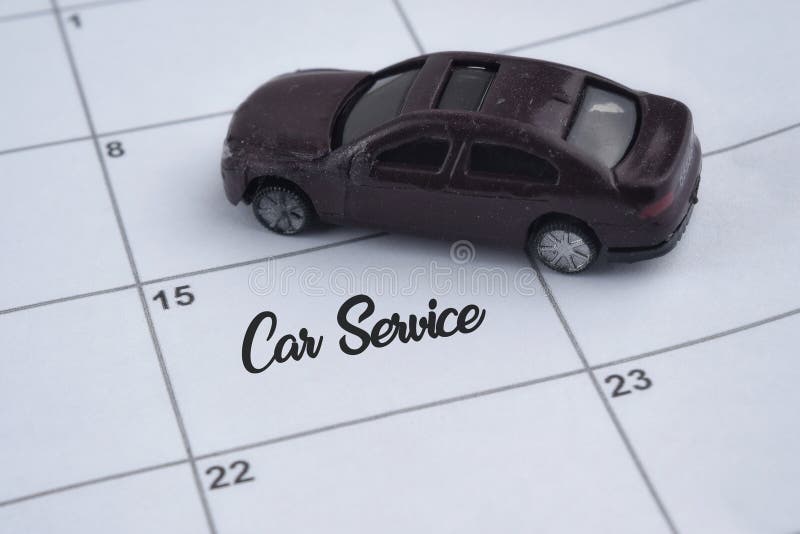 Selective Focus Image of Car Miniature on a Calendar with Car Service ...