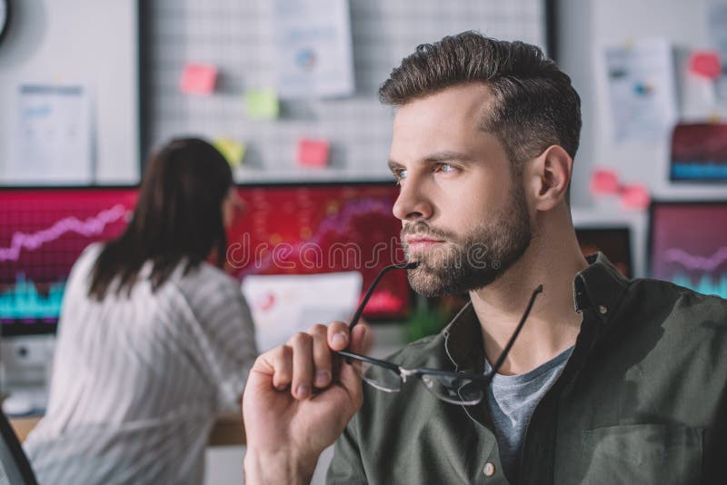 Selective Focus of Information Security Analyst Holding Eyeglasses ...
