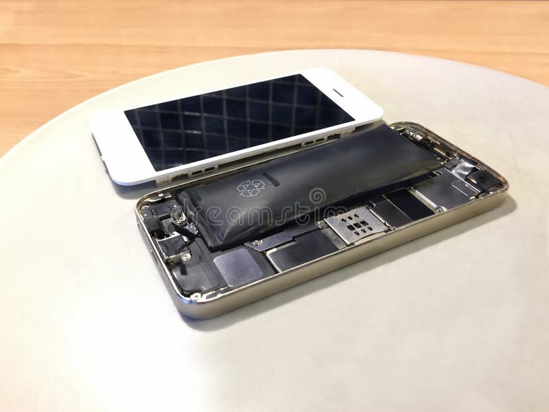 Selective Focus of Inside a Damaged Broken and Bloated Mobile Phone ...