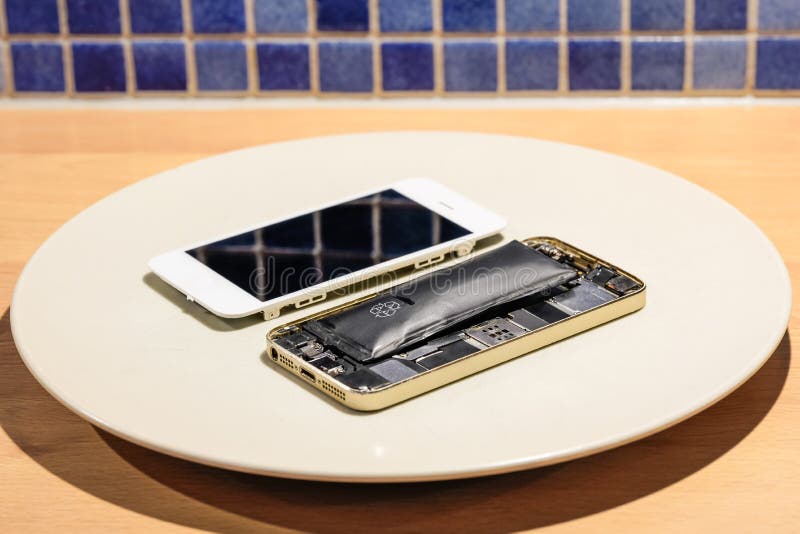 Selective Focus of Inside a Damaged Broken and Bloated Mobile Phone ...