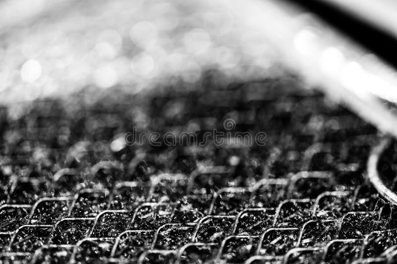 Selective Focus Macro of a Dirty Kitchen Range Hood Filter Clogged with ...