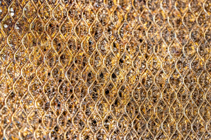 Selective Focus Macro of a Dirty Kitchen Range Hood Filter Clogged with ...