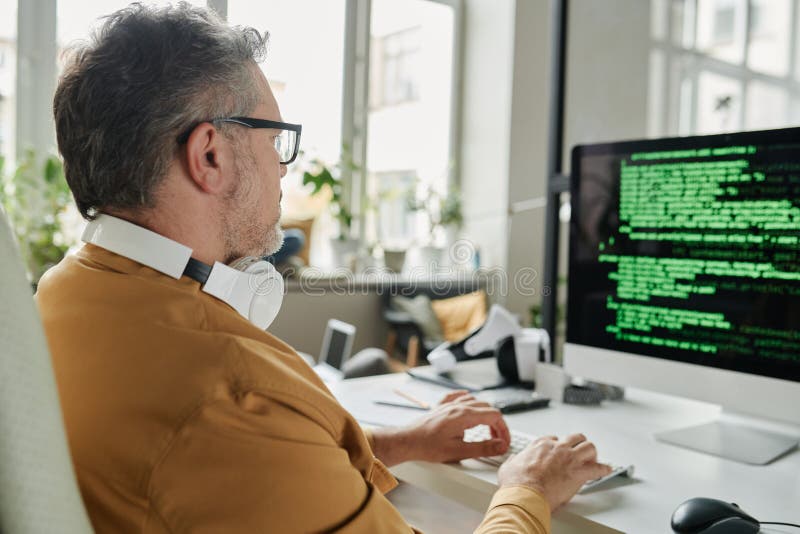 Selective Focus on Mature it Engineer Decoding Information Stock Image ...