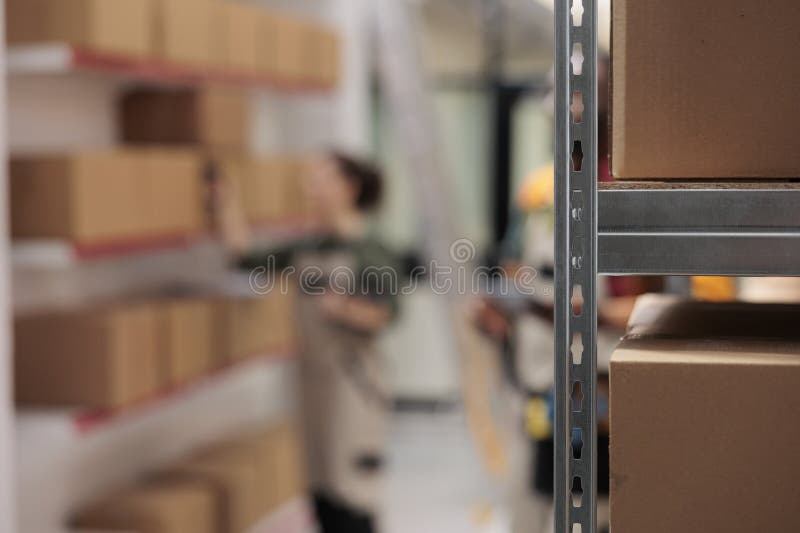 Selective Focus of Metallic Shelves Full with Carton Boxes Stock Photo ...