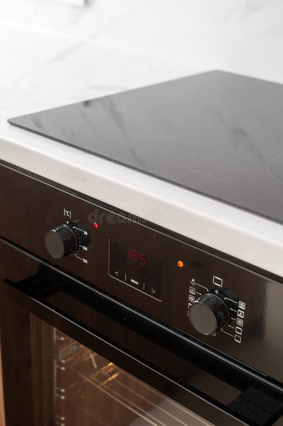 Black Electric Oven with Timer Display in Kitchen Stock Image - Image ...