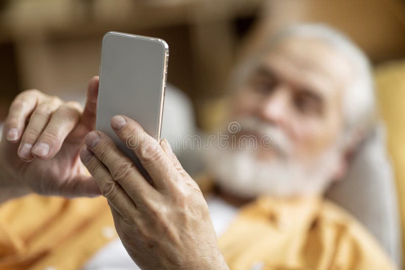 Selective Focus on Modern Smartphone in Senior Man Hands Stock Photo ...