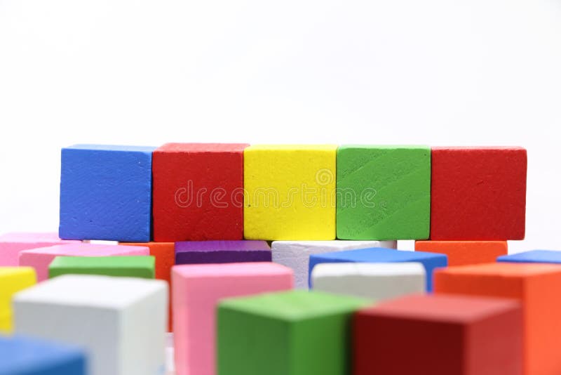 Selective Focus of Multi Coloured Wooden Blocks Isolated on White ... Selective Focus of Multi Coloured Wooden Blocks Isolated on White ...