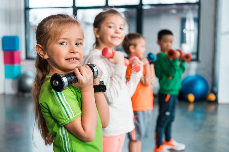 Children Lined Up Ready To Race Stock Image - Image of cute, friendship ...