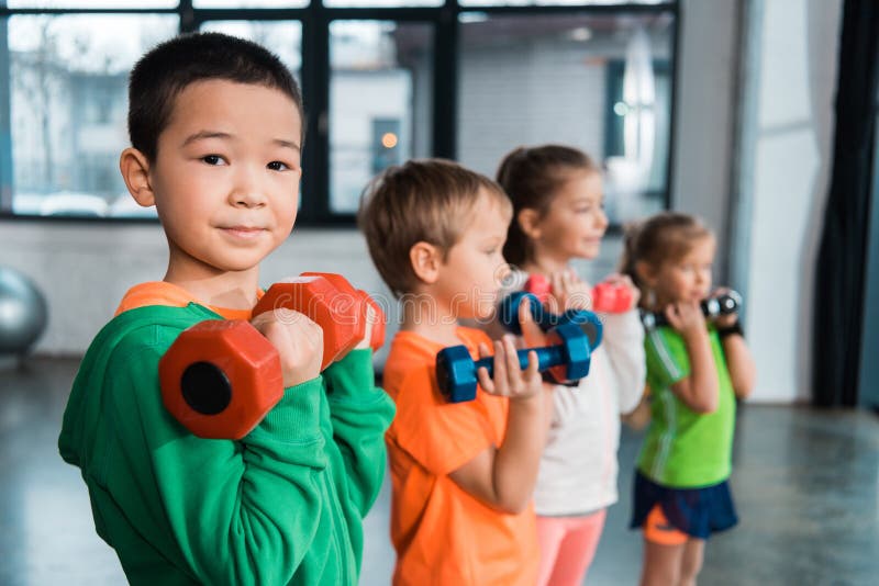 Children Lined Up Ready To Race Stock Image - Image of cute, friendship ...