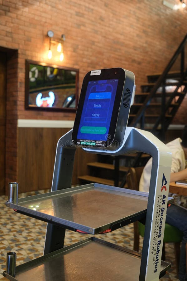 Robot serving food editorial stock image. Image of autonomous - 239626564