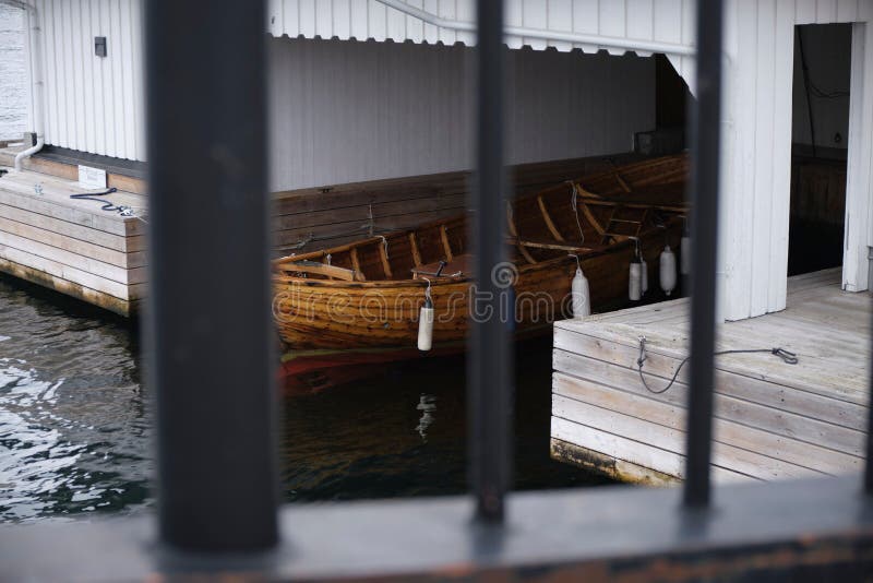 Selective Focus on an Old Wooden Boat Harbored on a Dock Stock Photo ...