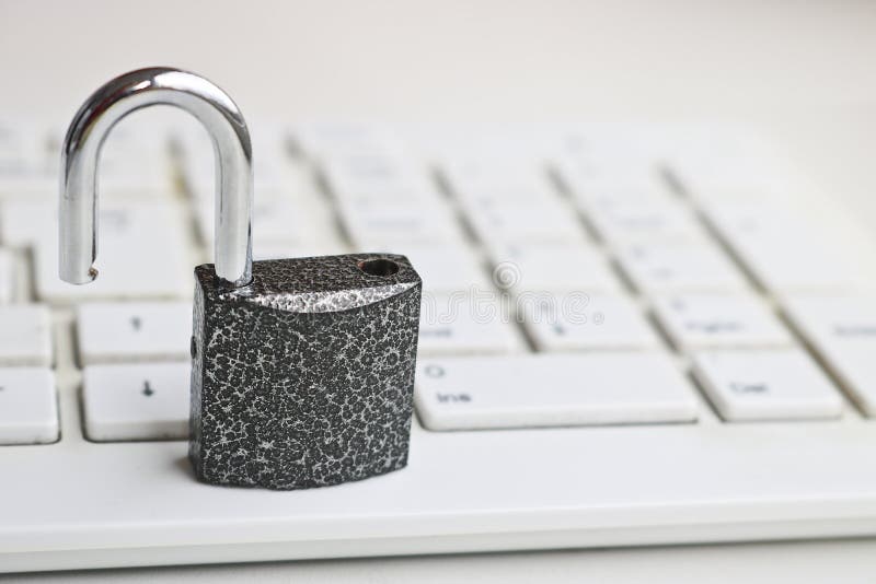 Selective Focus Open Lock on a White Keyboard. Cybersecurity Concept ...