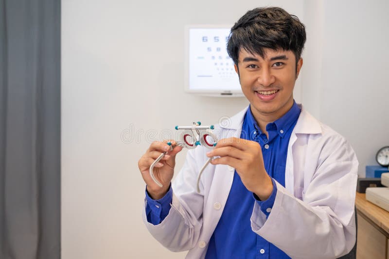 Selective Focus at Optometry Trail Frame. Asian Doctor Optometrist ...