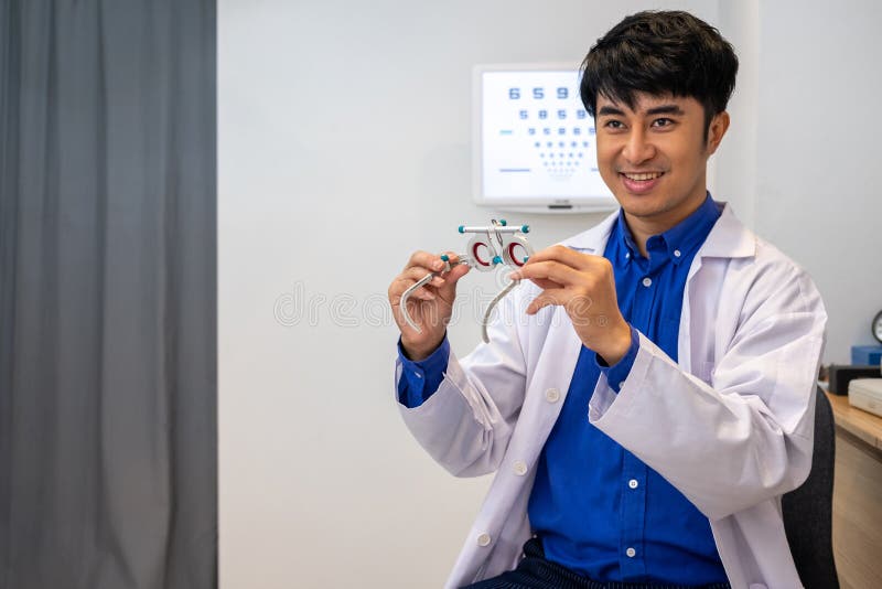 Selective Focus at Optometry Trail Frame. Asian Doctor Optometrist ...