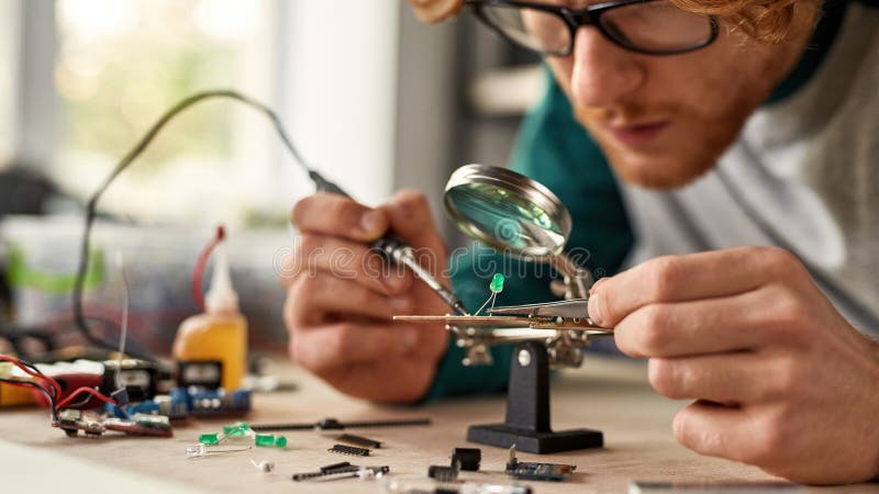 Man Wear Glasses Solder Chip with Soldering Iron Stock Image - Image of ...