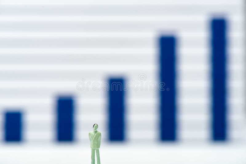 Selective Focus of People Figure on White Surface with Infographics at ...