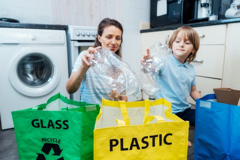Mother is Teaching Kid How To Recycle Help the Boy Aware Environmental ...