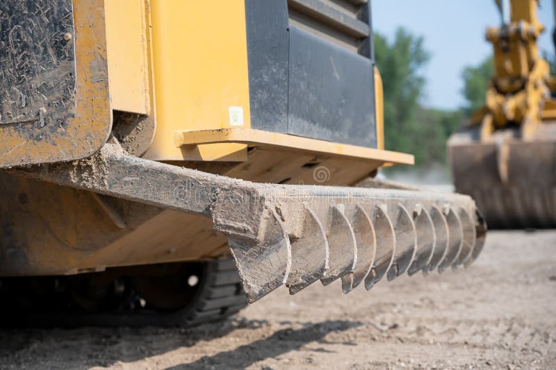 Selective Focus on a Raised Root Rake Attachment on a Skid Steer ...