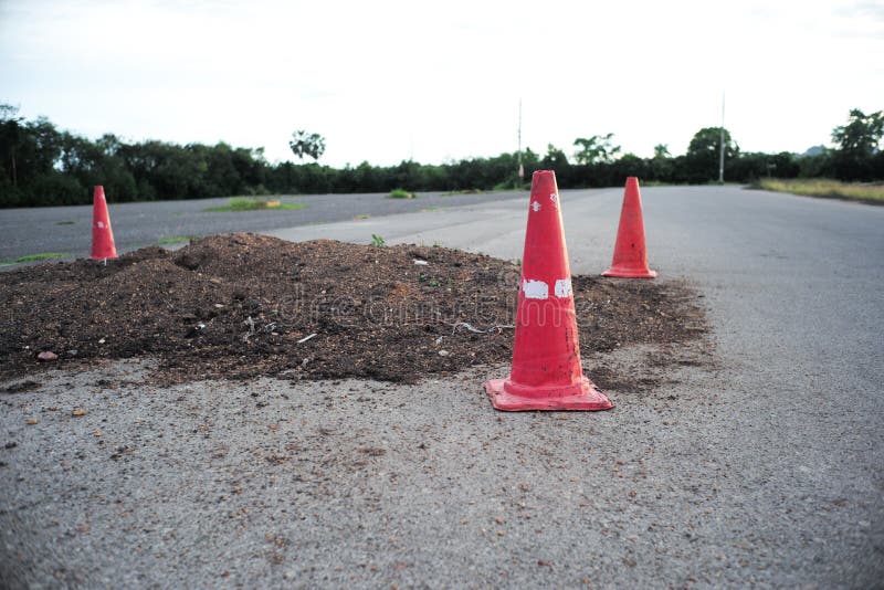 Selective Focus on the Red Cone on the Asphalt Road Under Construction ...