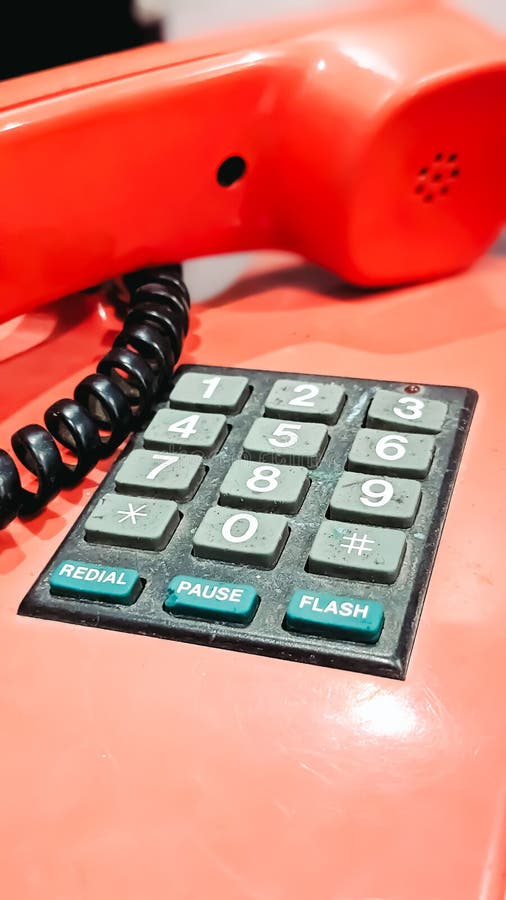Selective Focus. a Red Old-fashioned Telephone with Redial, Pause and ...