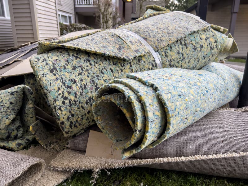 Selective Focus on Ripped Up Old Carpet Discarded in the Yard Outside ...